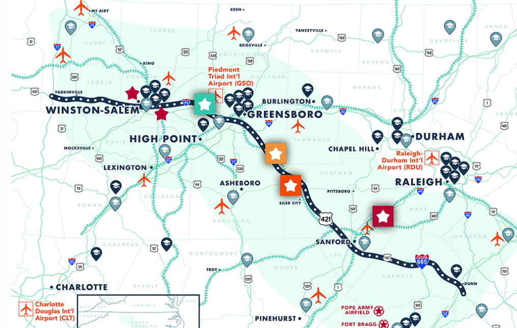 Bus tour travels past state's biggest economic wins - Business North ...